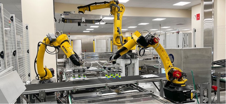 DEMO MAXIMIZE PRODUCTION WITH 8 FANUC ROBOTS 24/7 - usedrobotstrade.com